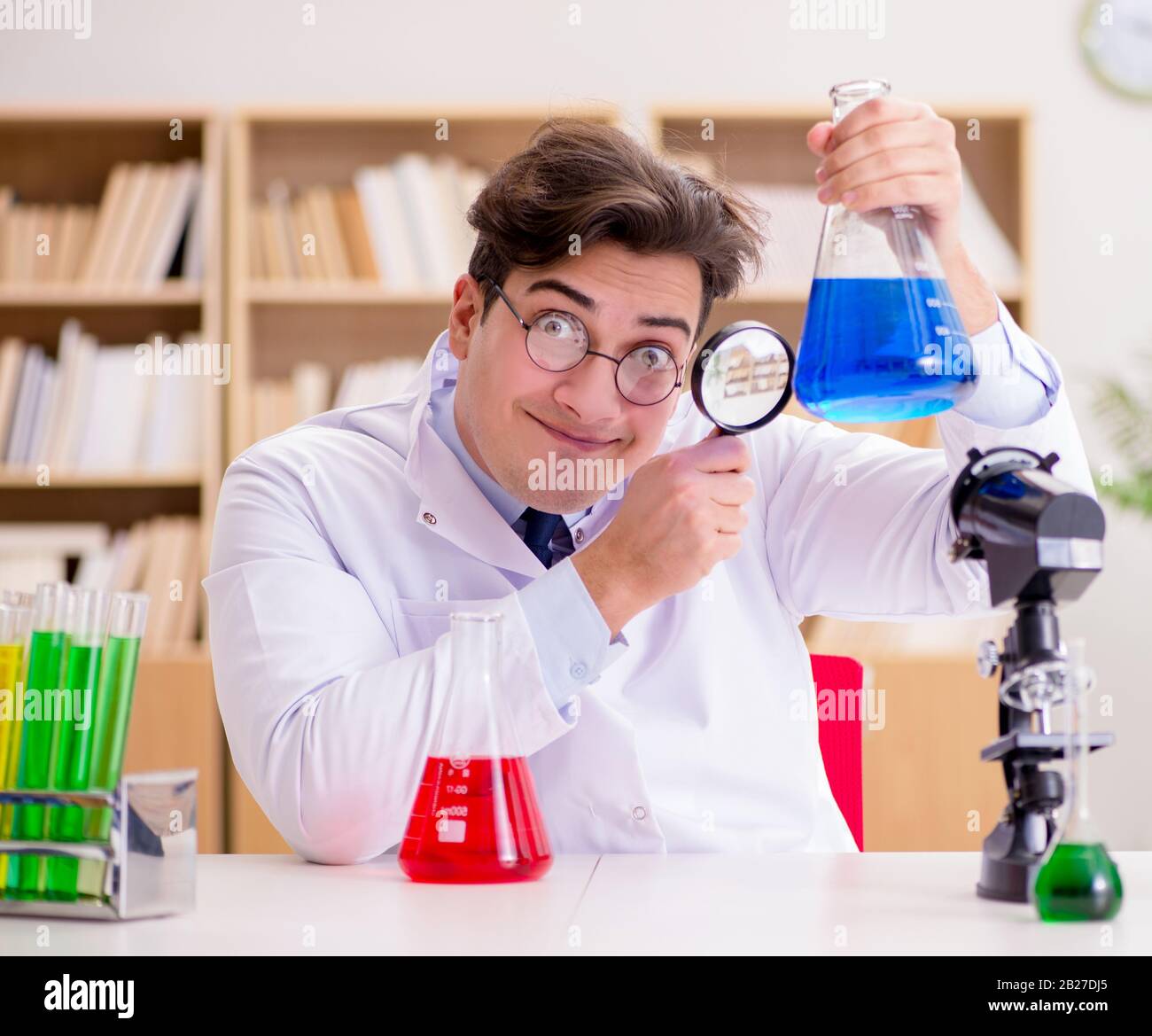 The mad crazy scientist doctor doing experiments in a laboratory Stock ...