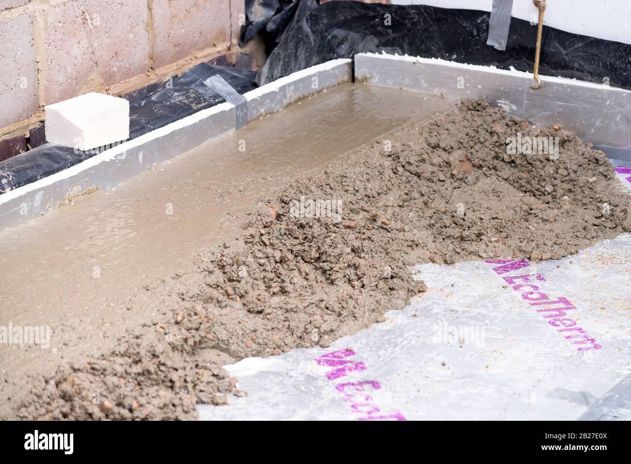 Fill the cement ground for house extension Stock Photo - Alamy