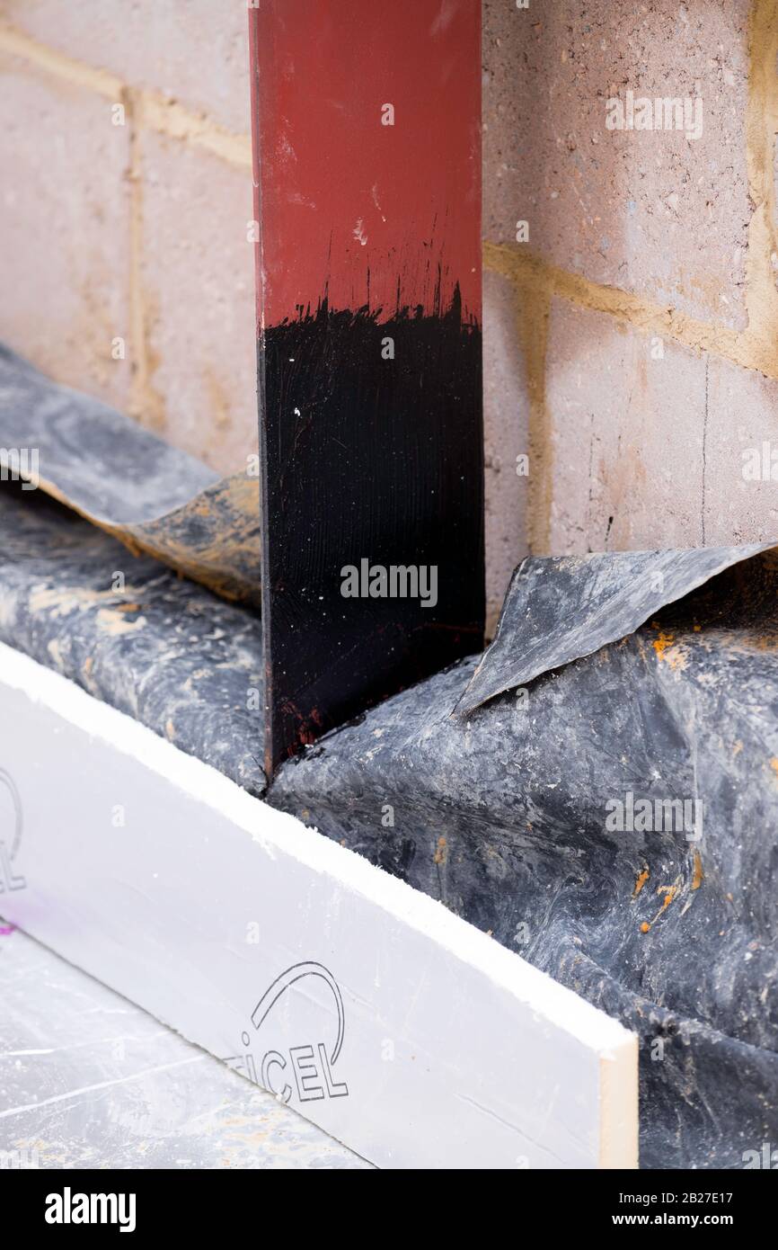 Metal post for support wall for extension Stock Photo - Alamy