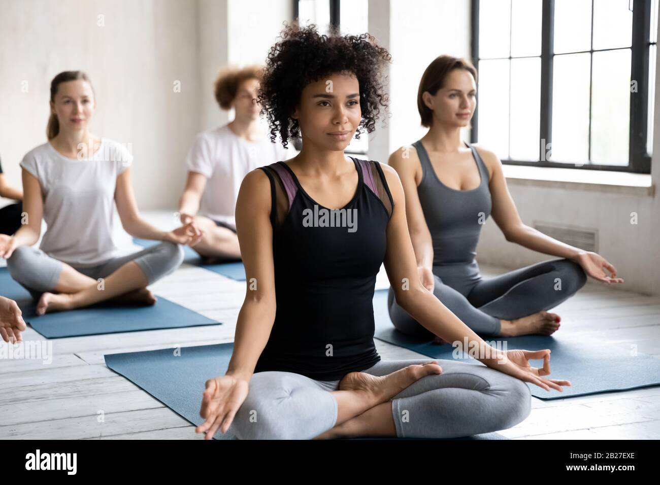 African ethnicity coach lead group training do meditation practice ...