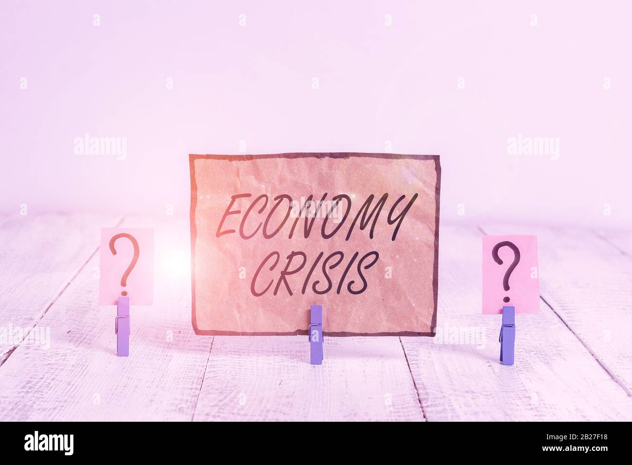 Writing note showing Economy Crisis. Business concept for the economy ...