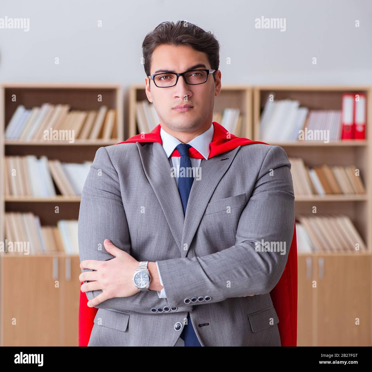The superhero businessman working in the office Stock Photo - Alamy