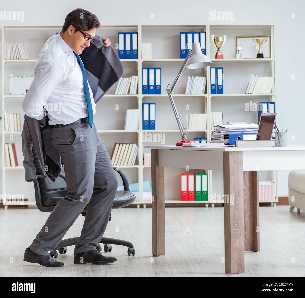 The businessman having fun taking a break in the office at work Stock ...