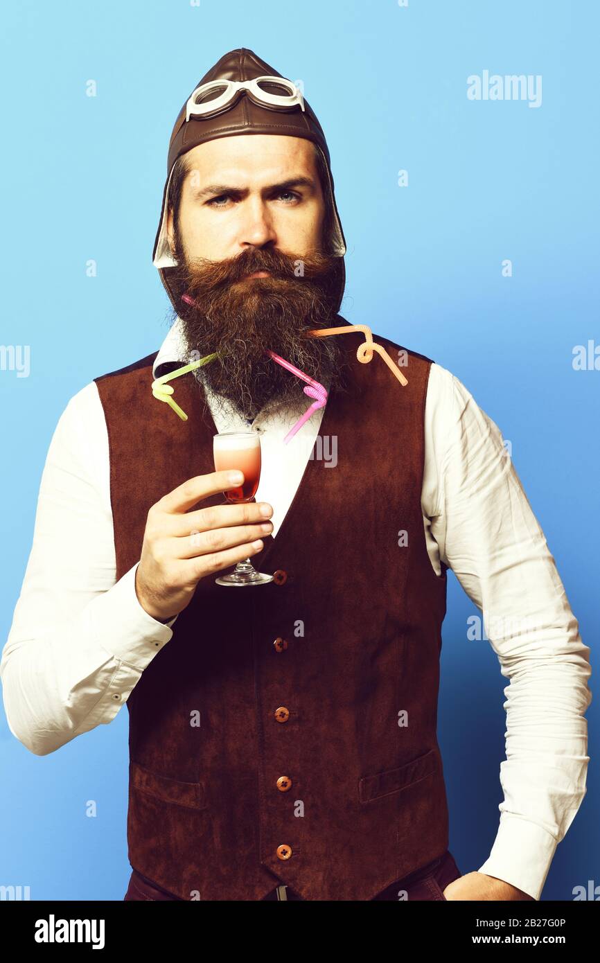 handsome bearded pilot or aviator man with long beard and mustache on ...