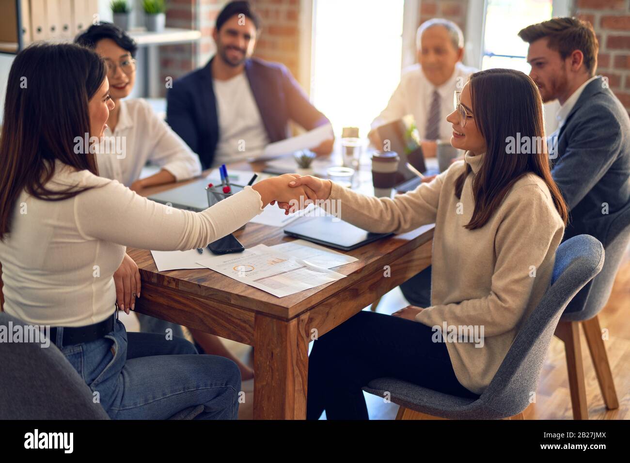 Group of business workers smiling happy and confident. Working together ...