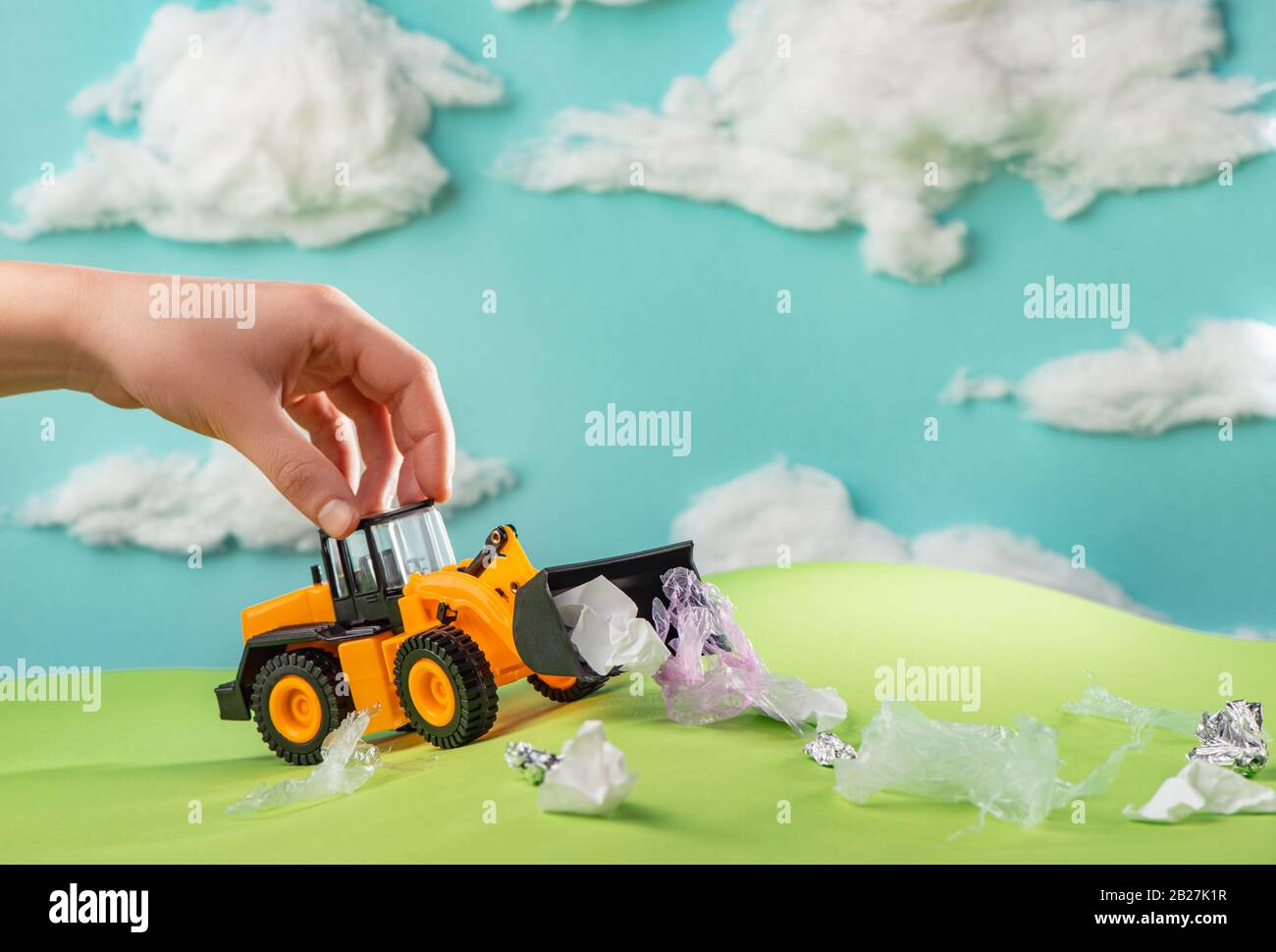 Child collection garbage hi-res stock photography and images - Alamy