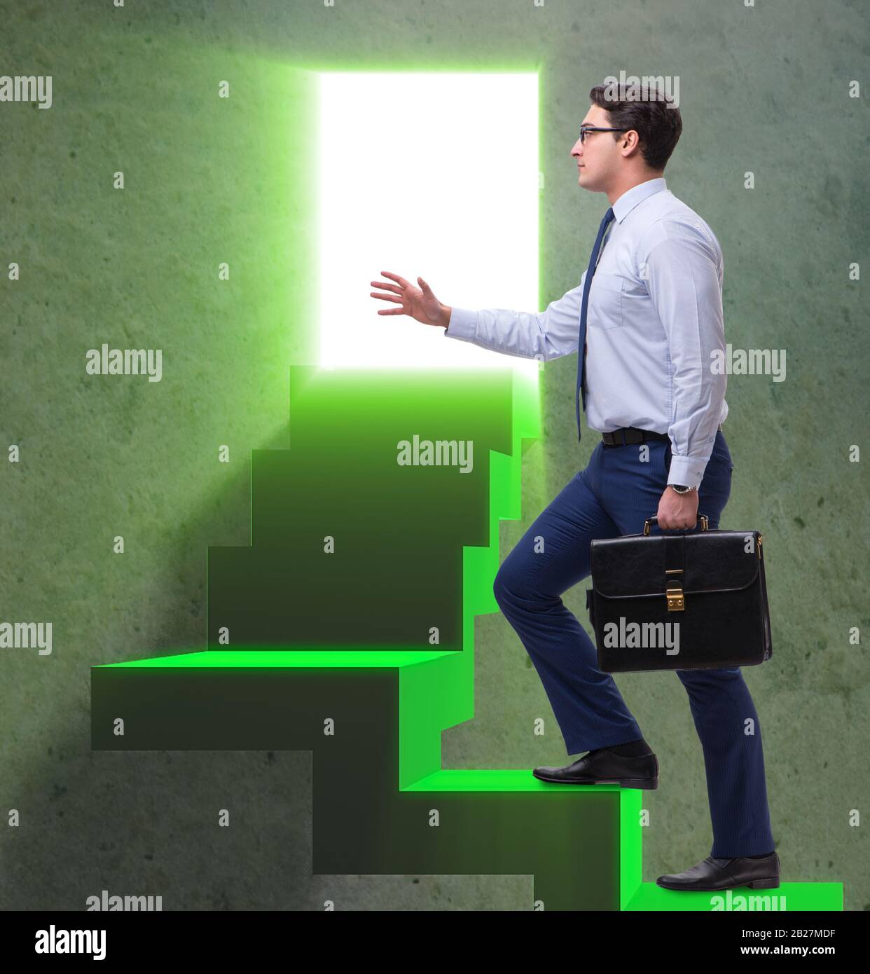 The young businessman climbing career ladder Stock Photo - Alamy