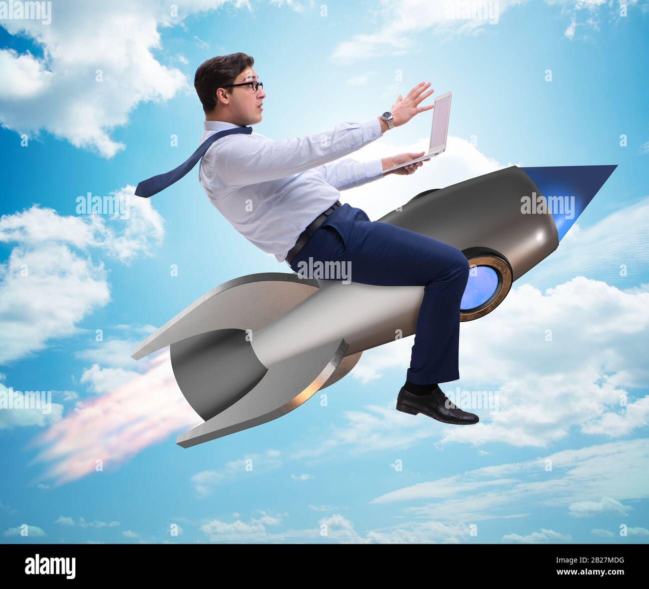 The businessman flying on rocket in business concept Stock Photo - Alamy