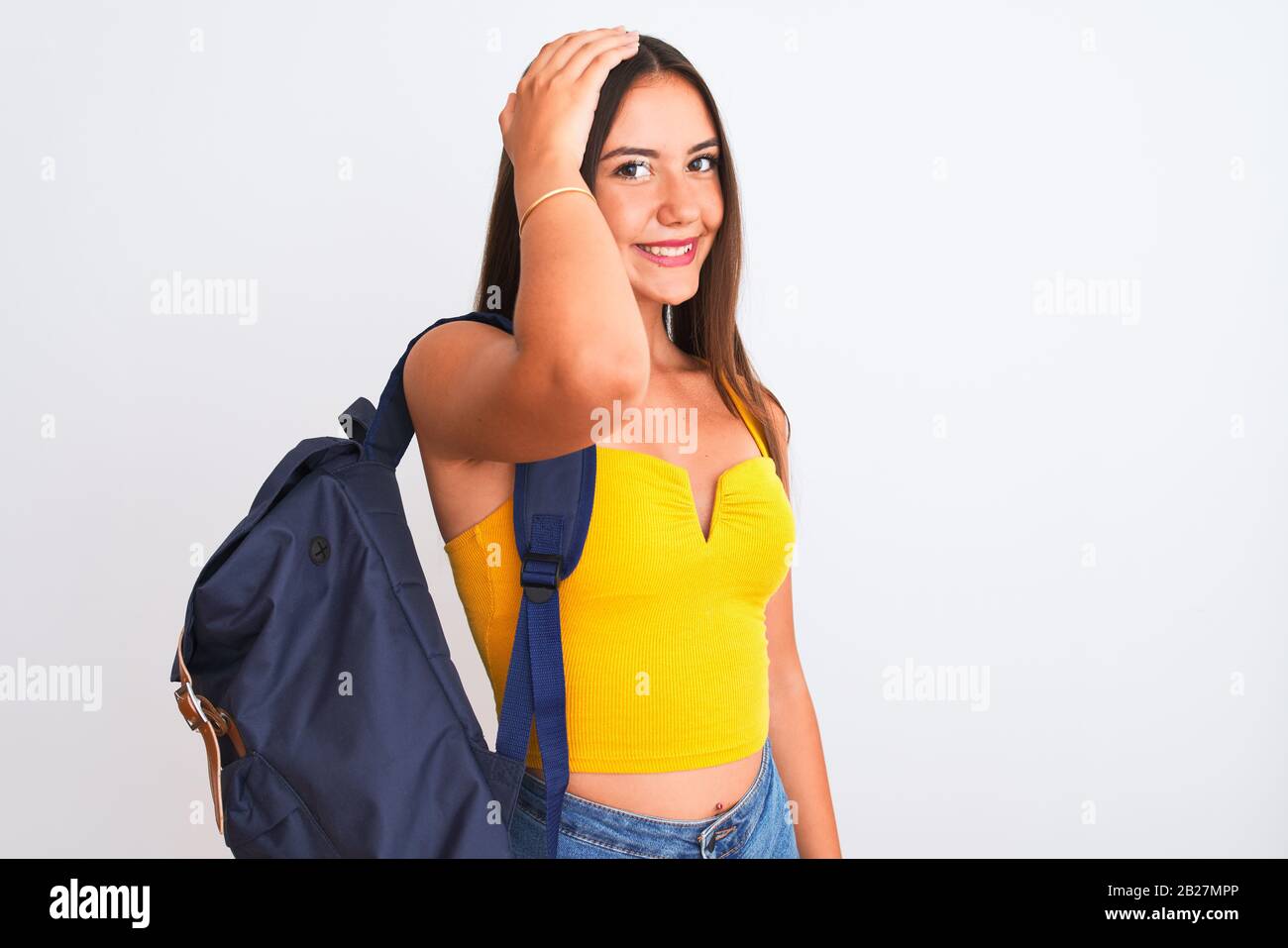 Young beautiful student girl wearing backpack standing over isolated ...