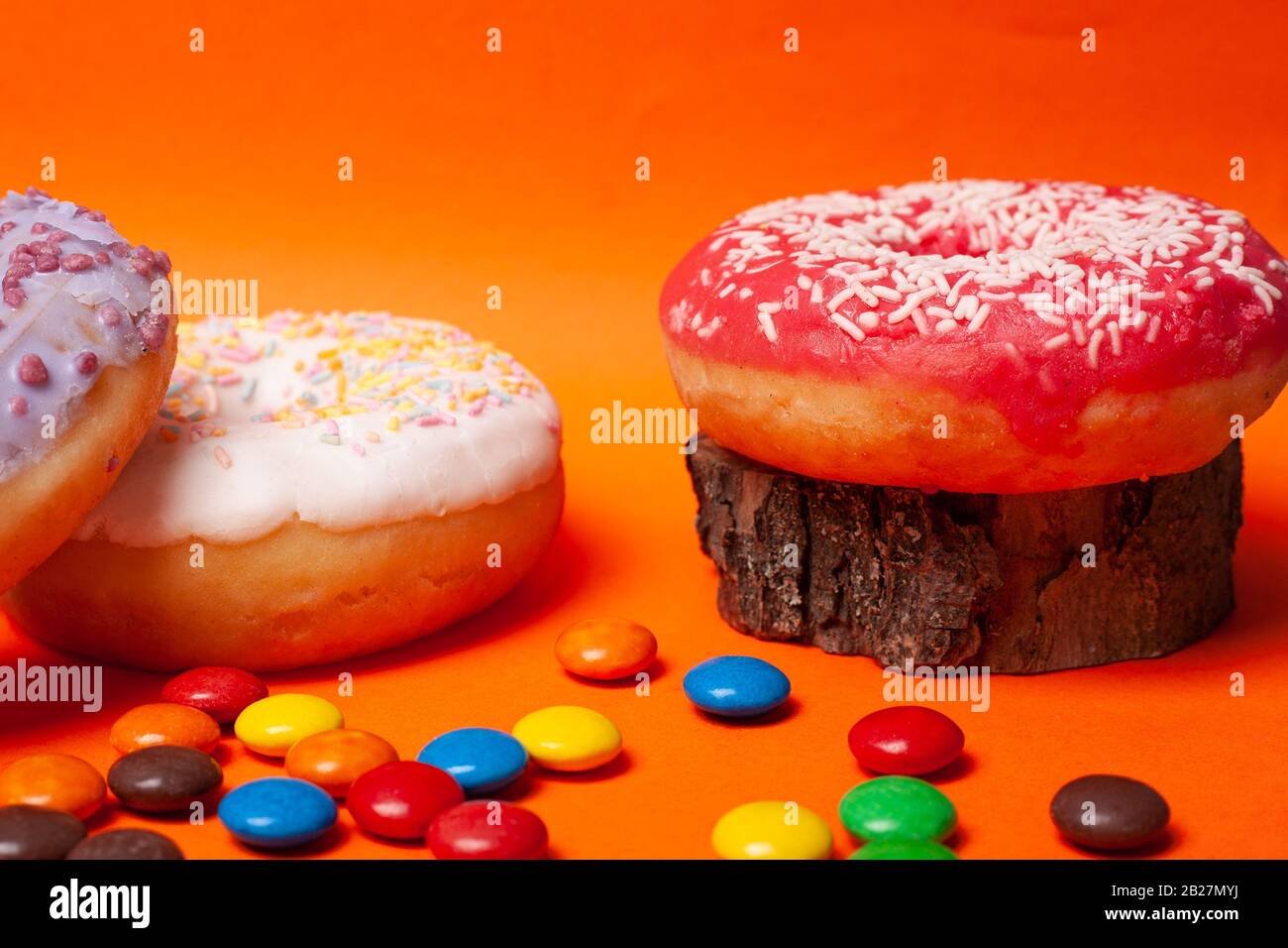 Orange donut hi-res stock photography and images - Alamy