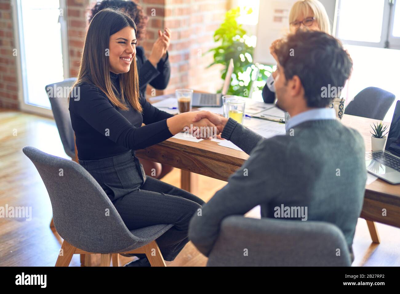Group of business workers smiling happy and confident. Working together ...