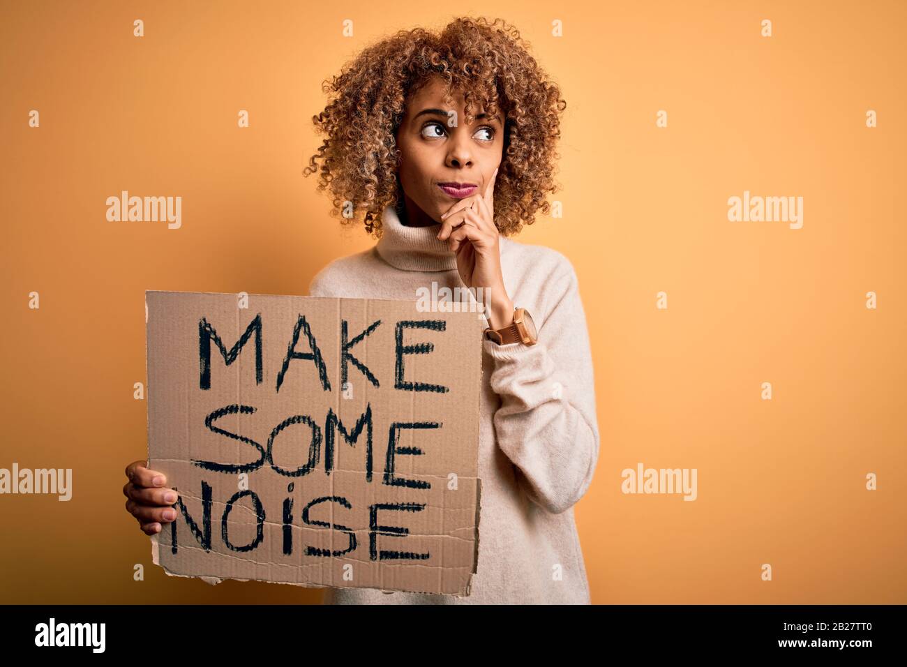 African american activist woman asking for revolution holding banner ...