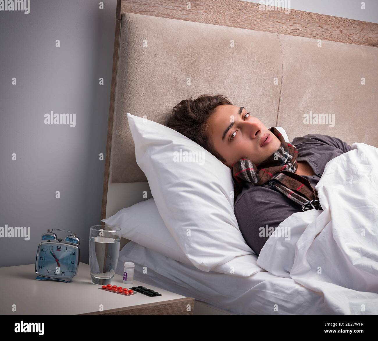 The sick man resting in the bed Stock Photo - Alamy