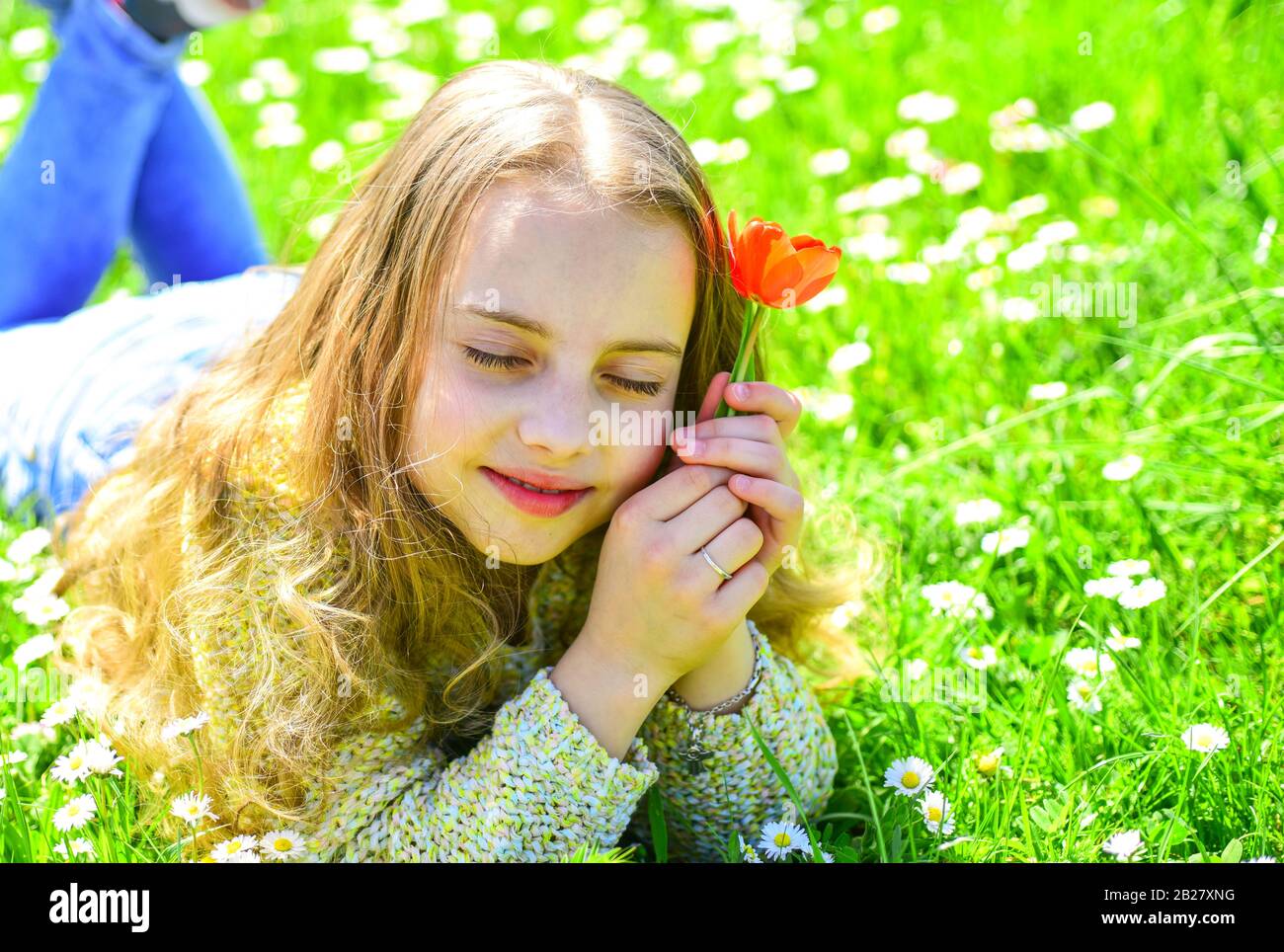 Child flower break hi-res stock photography and images - Alamy