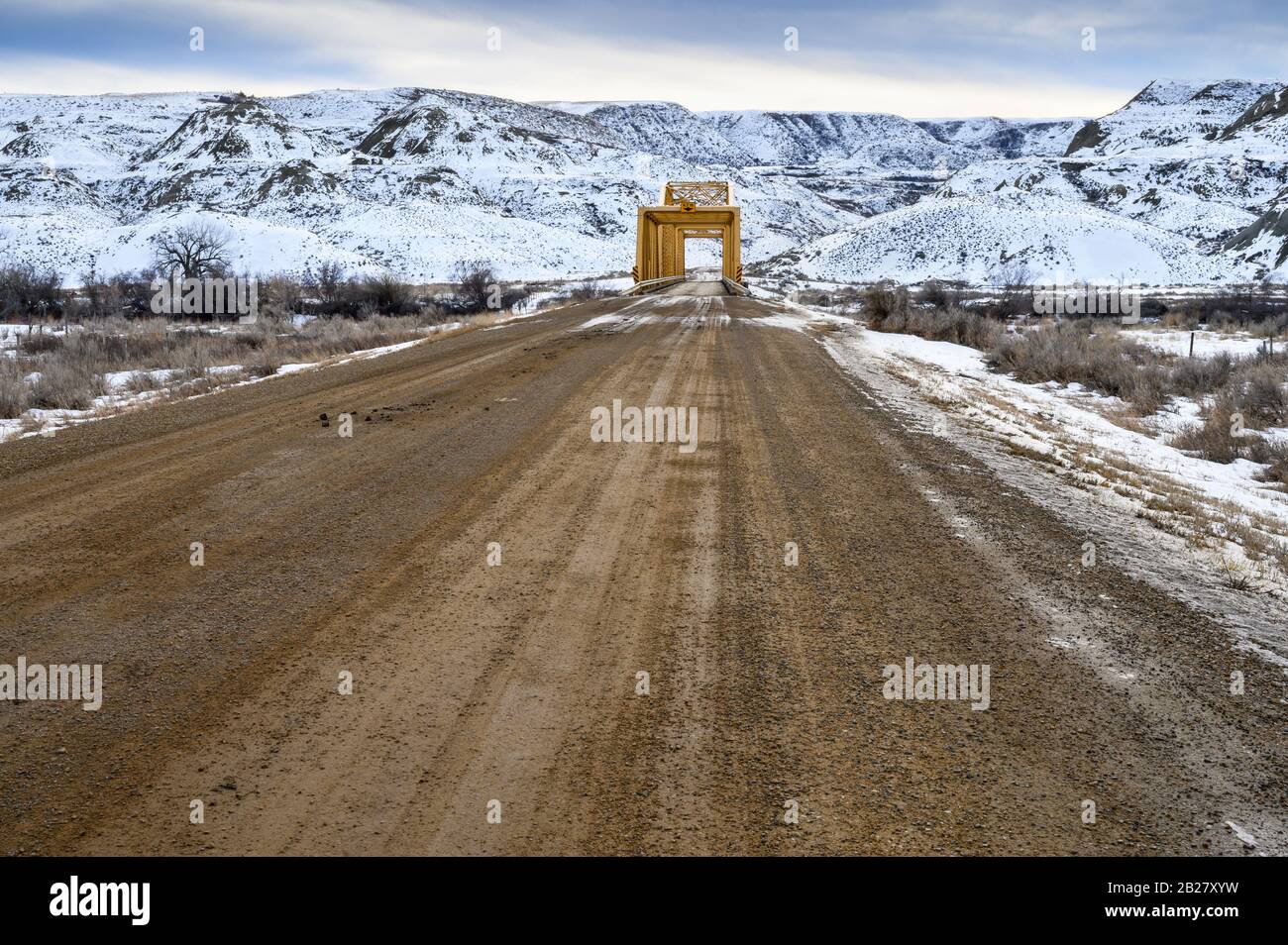 Winter view of the old steel truss bridge across the Red Deer River at ...