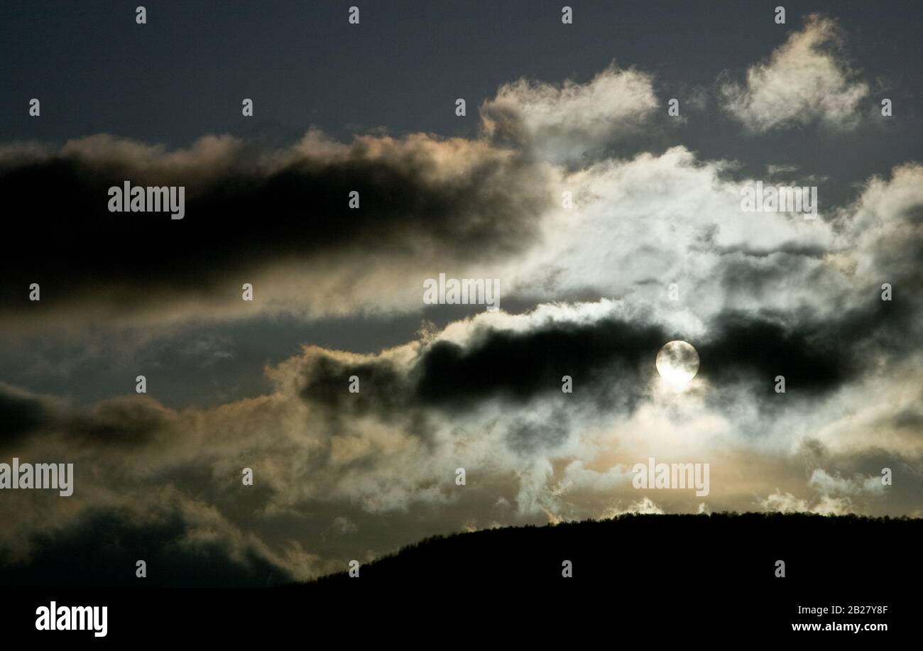 Clouds covering the sun hi-res stock photography and images - Alamy