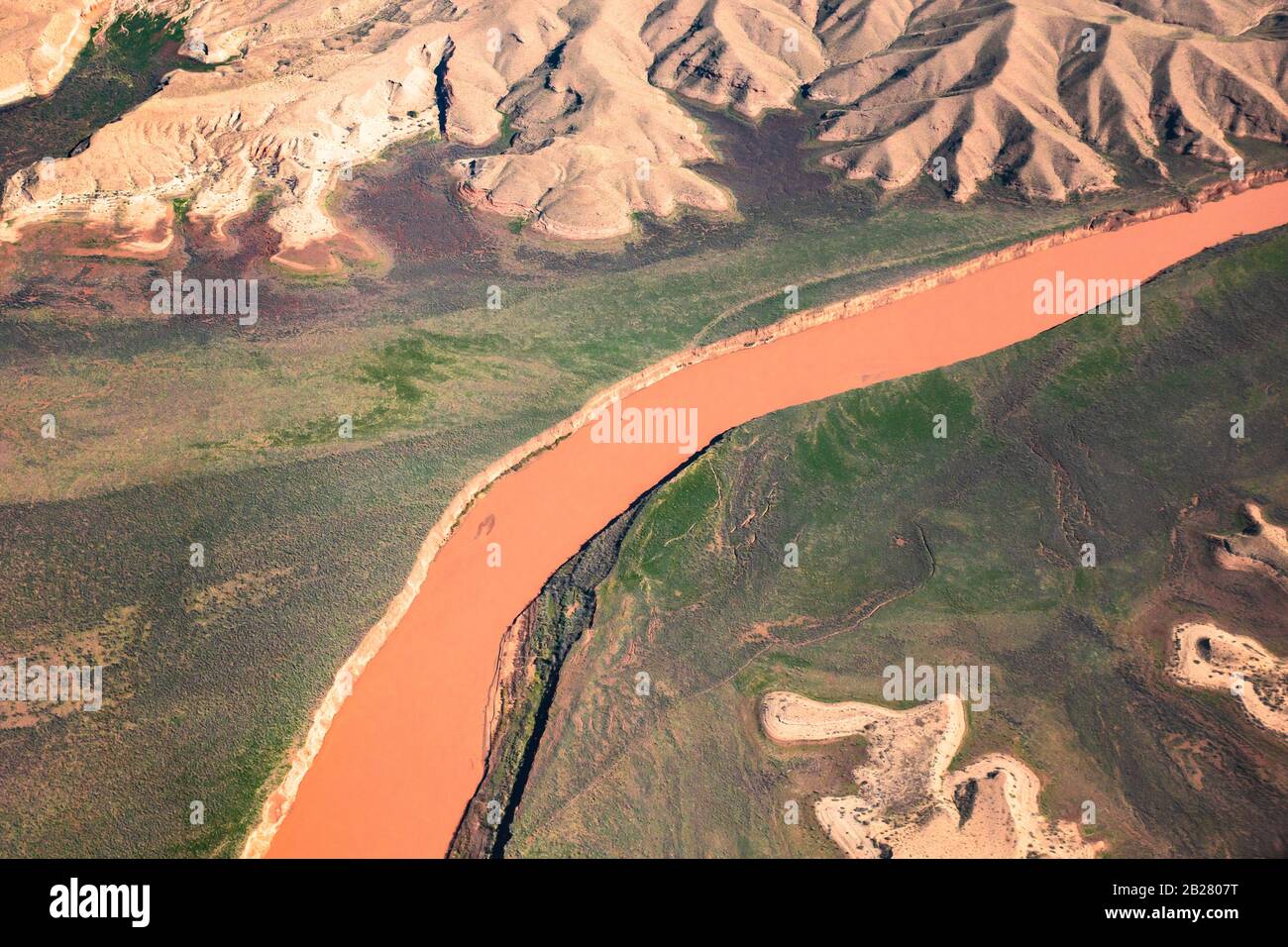 Aerial Photography of landforms over Arizona with Colorado River in ...