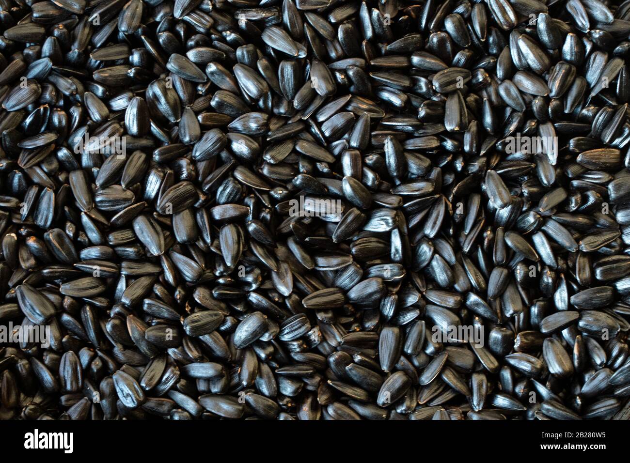 Small black seeds hi-res stock photography and images - Alamy