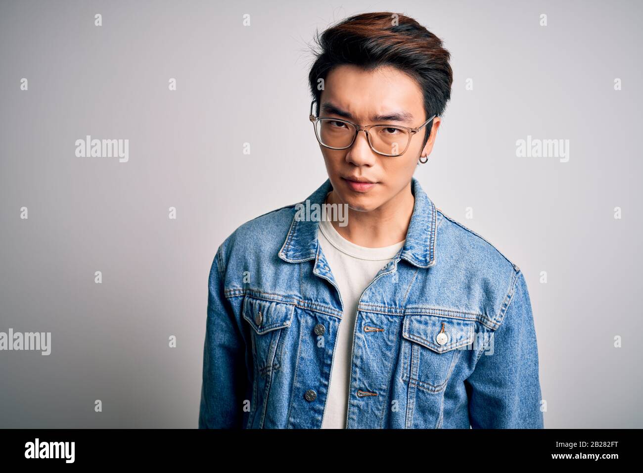 Grumpy chinese man hi-res stock photography and images - Alamy