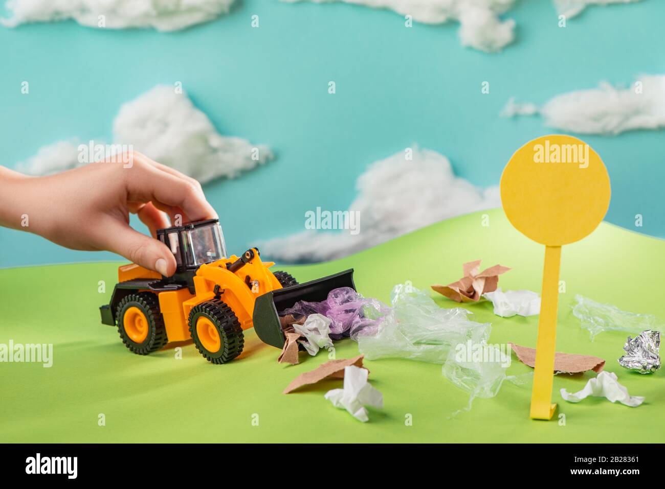 Child collecting garbage hi-res stock photography and images - Alamy