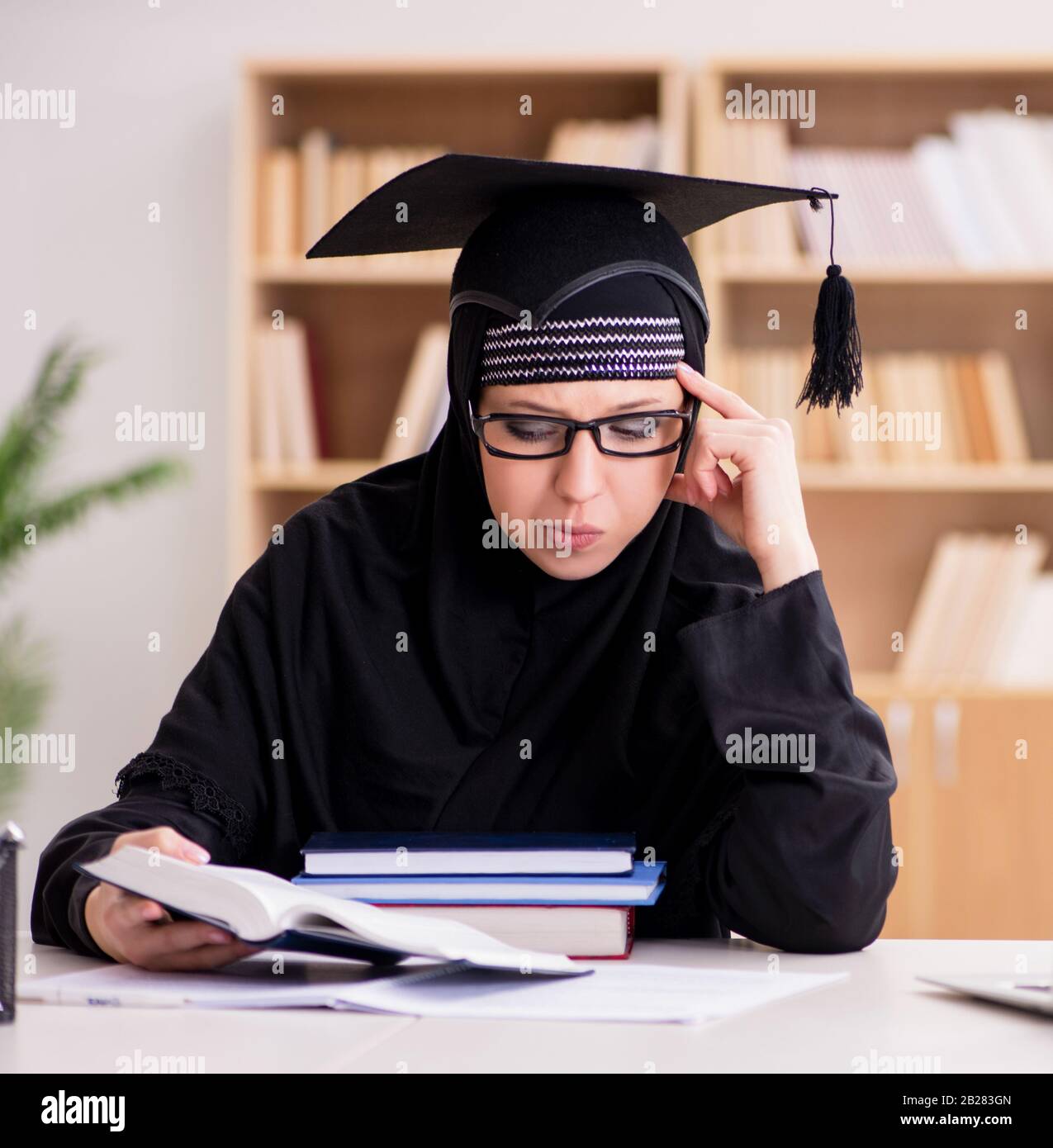 The muslim girl in hijab studying preparing for exams Stock Photo - Alamy
