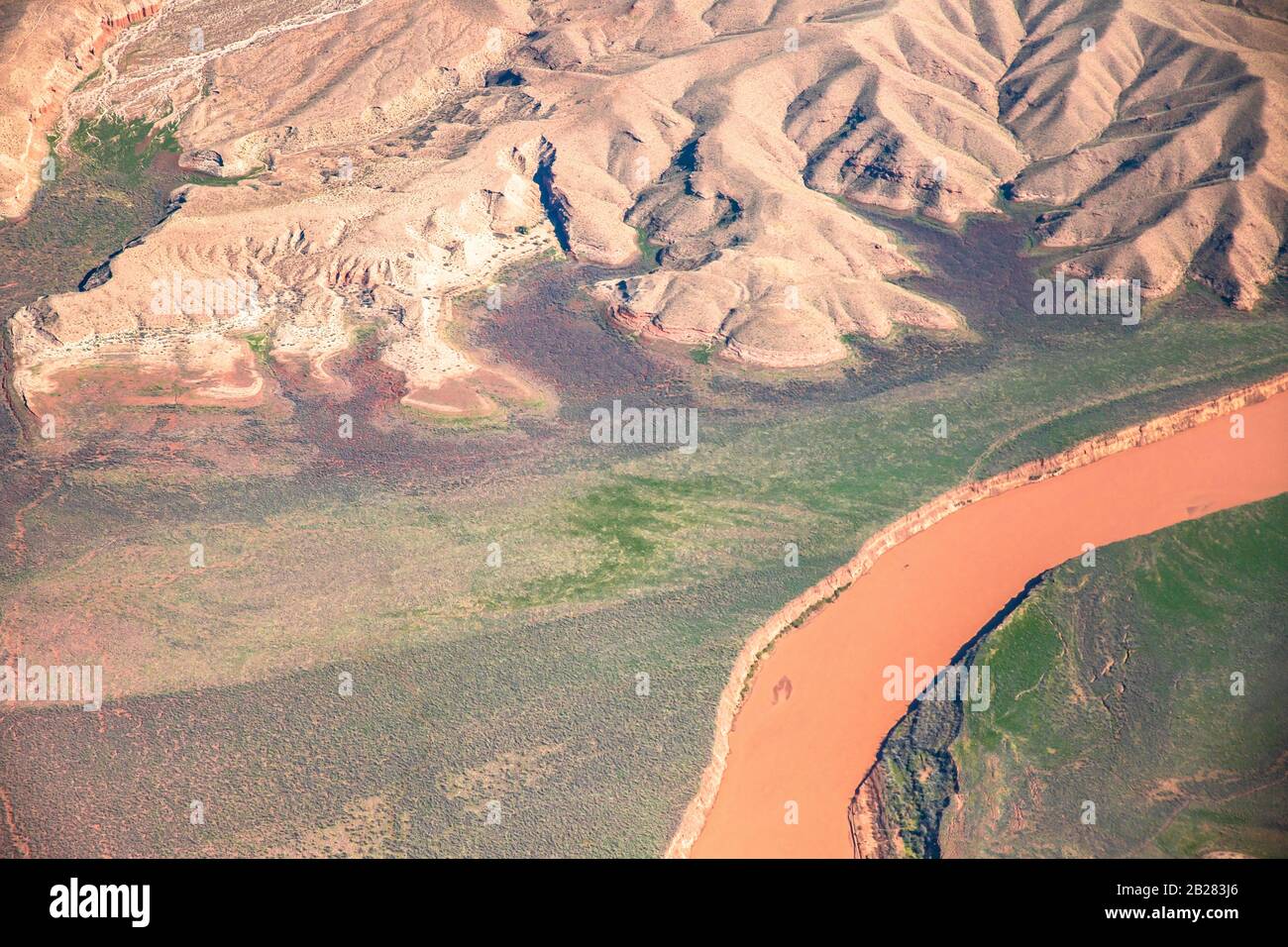 Aerial Photography of landforms over Arizona with Colorado River in ...