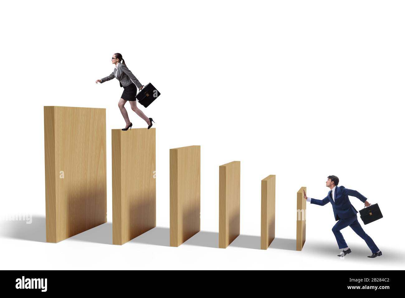 Domino effect and the competition concept Stock Photo - Alamy