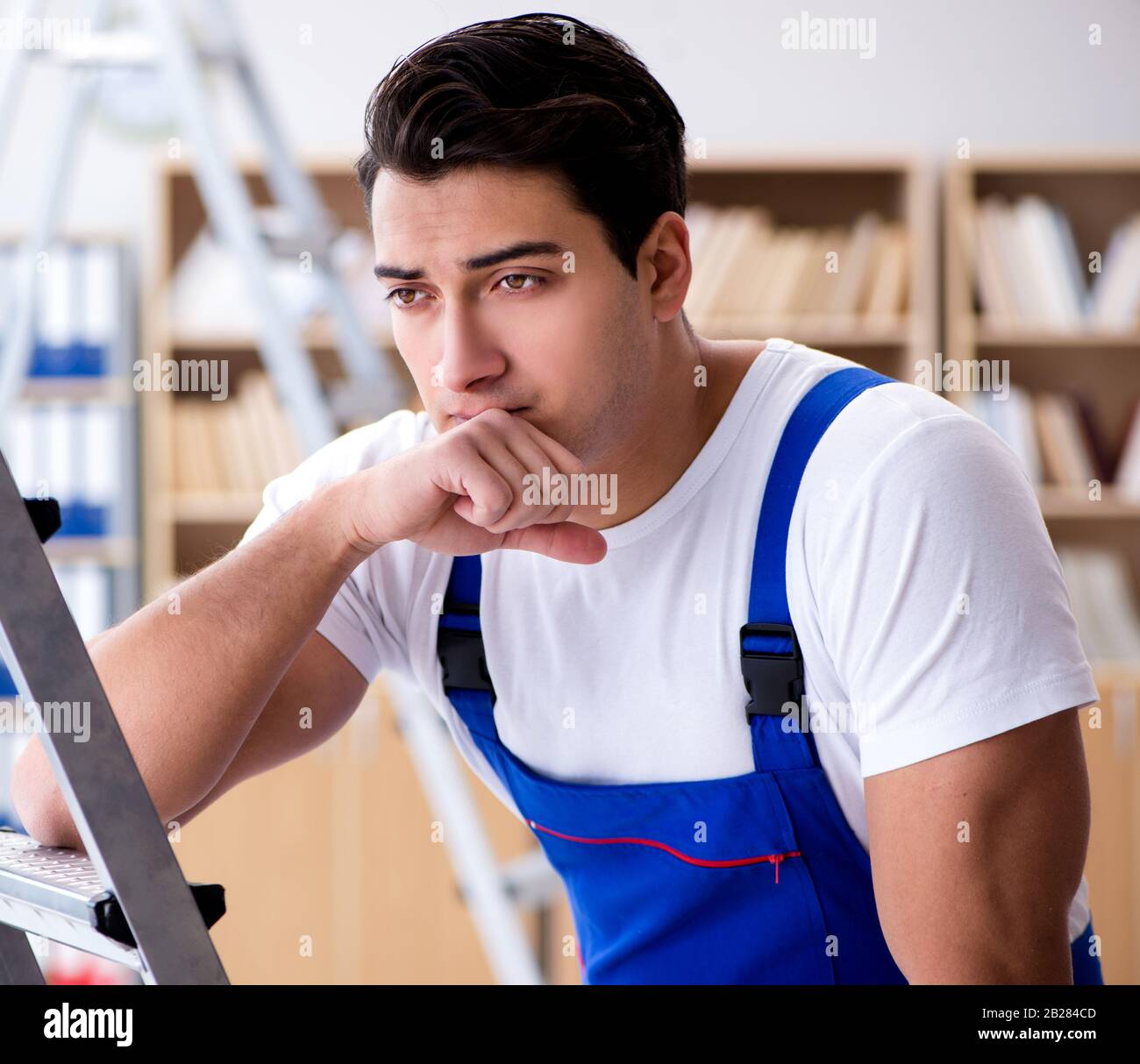 Thoughtful sad man leaning against hi-res stock photography and images ...