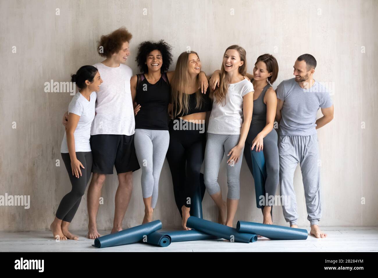 Group of seven people standing hi-res stock photography and images - Alamy