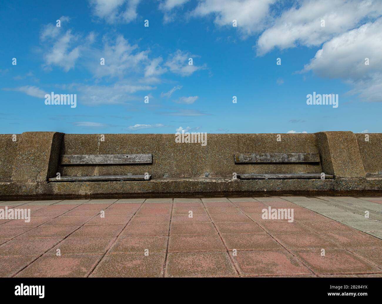 concrete and wooden bench on the promenade atnew brighton wirral august ...