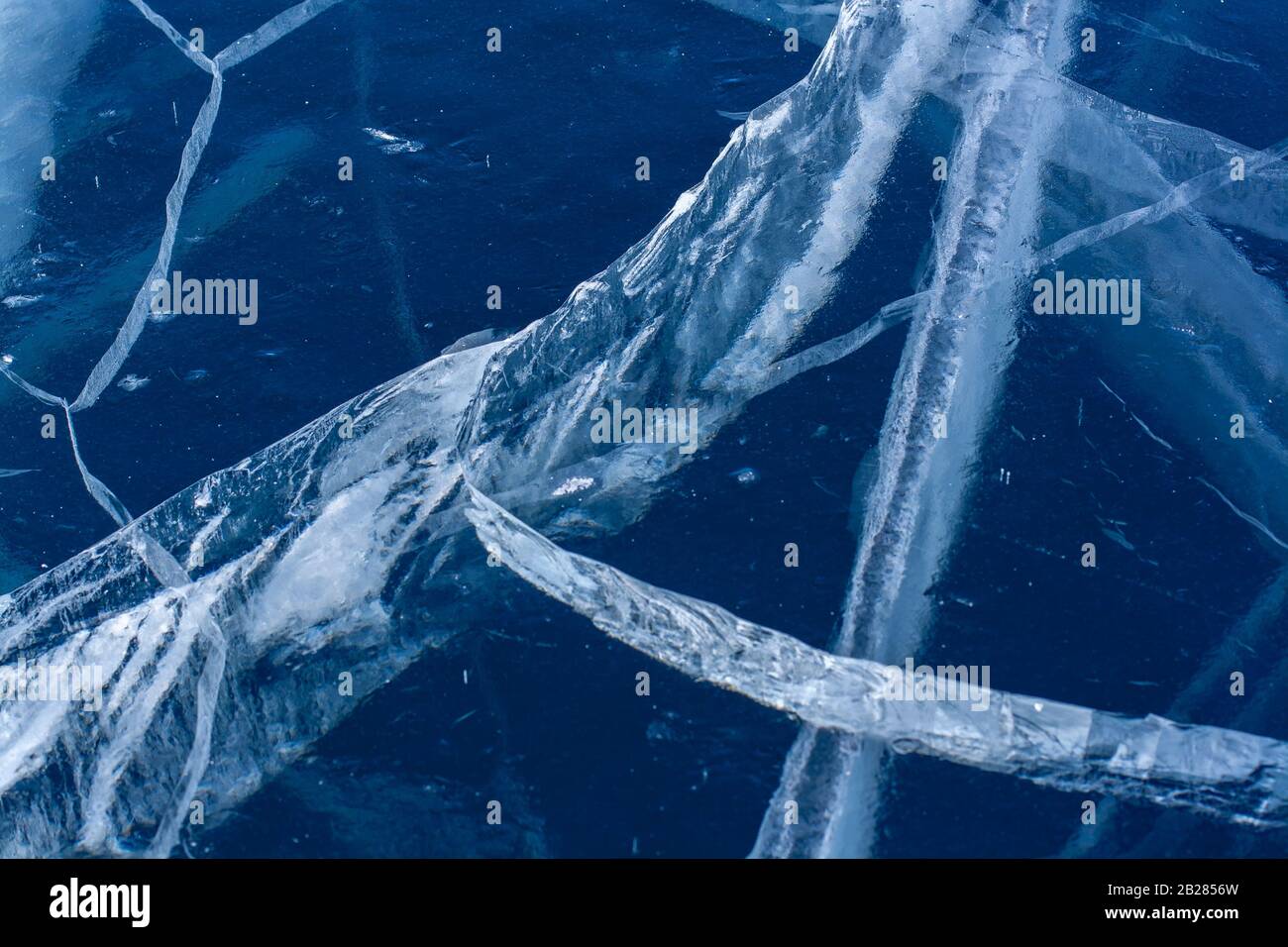 Natural deep cracks in the ice of Lake Baikal. The structure of ice is ...