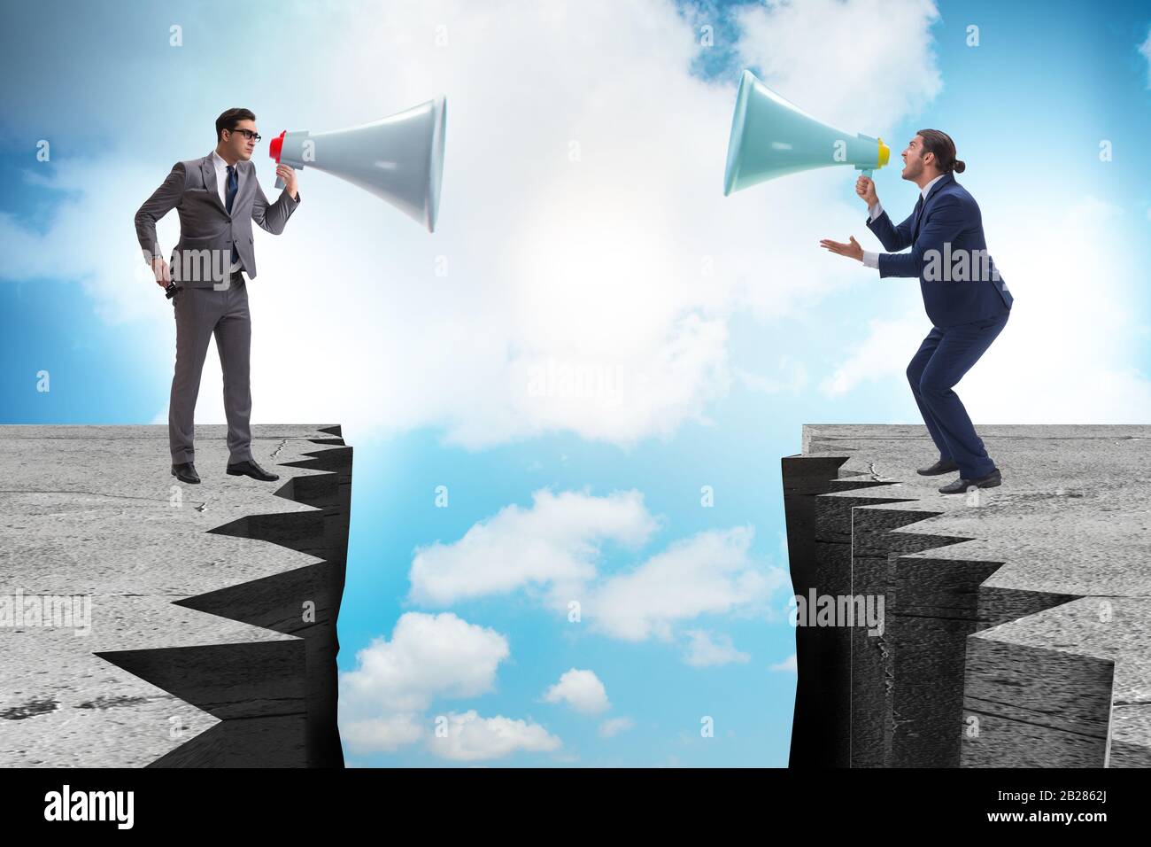 The businessman shouting with loudspeaker at each other Stock Photo - Alamy