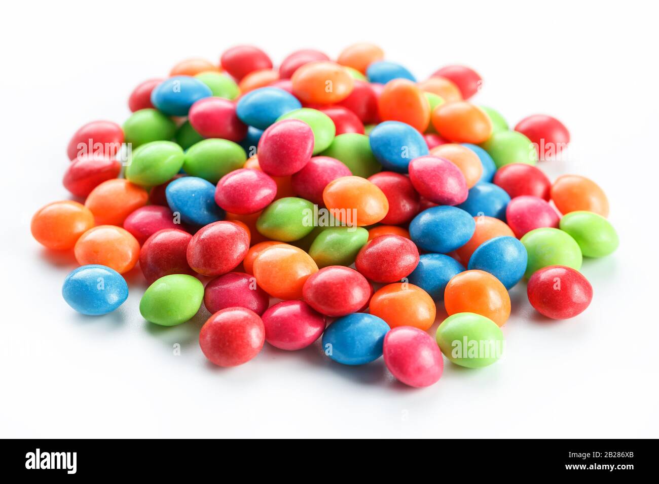 A rainbow of colors from multicolored candies close-up, multi-colored ...