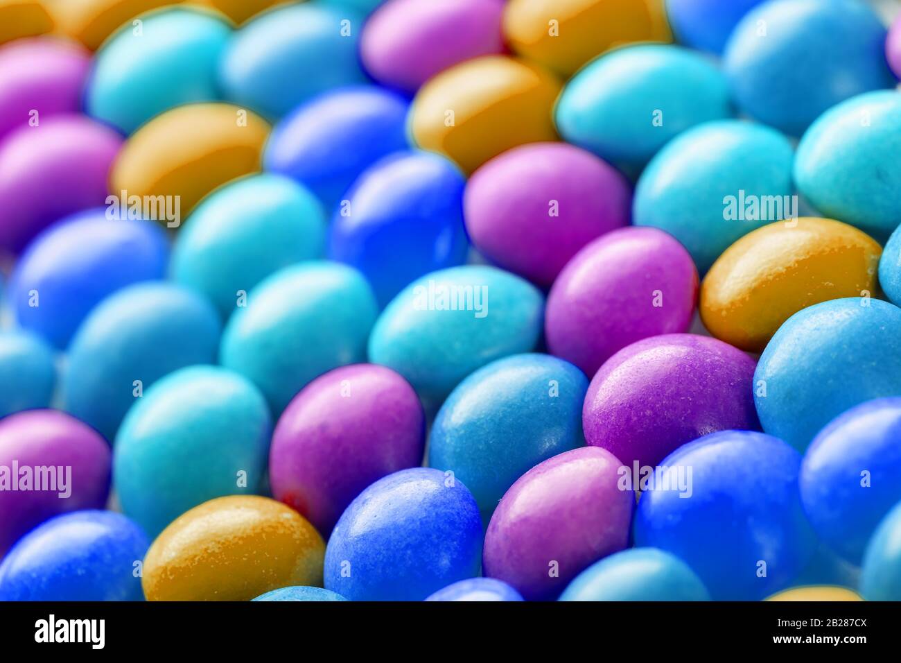 Texture-background of multicolored candies. Colors of the rainbow close ...
