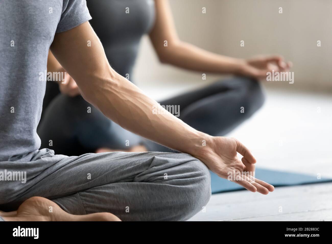 Meditation practice focus on male fingers folded in mudra symbol Stock ...
