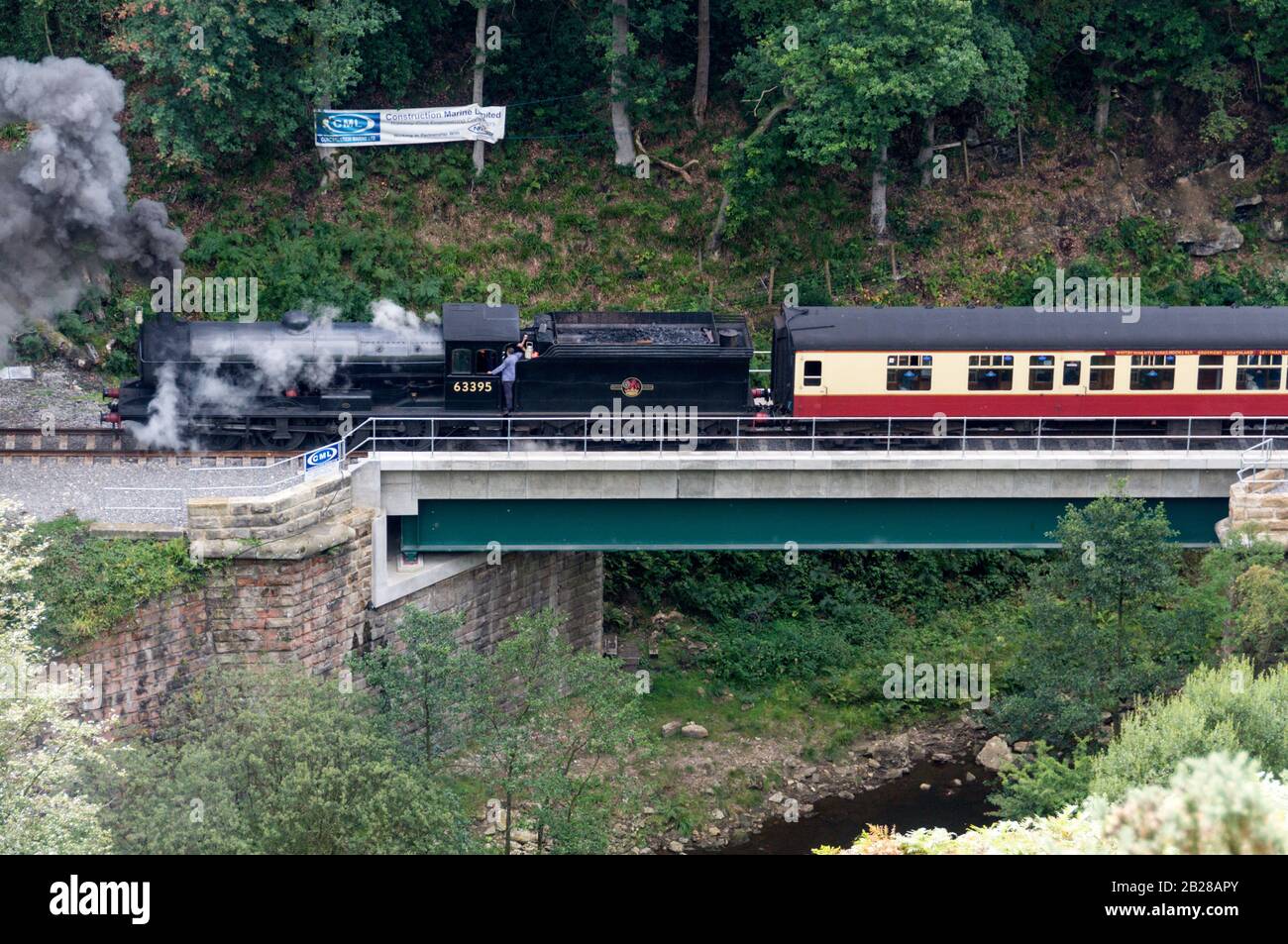 A steam train of the North Yorkshire Moors Railway on its way to ...