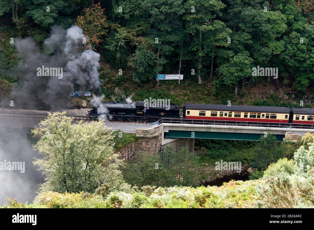 A steam train of the North Yorkshire Moors railway on its way to ...