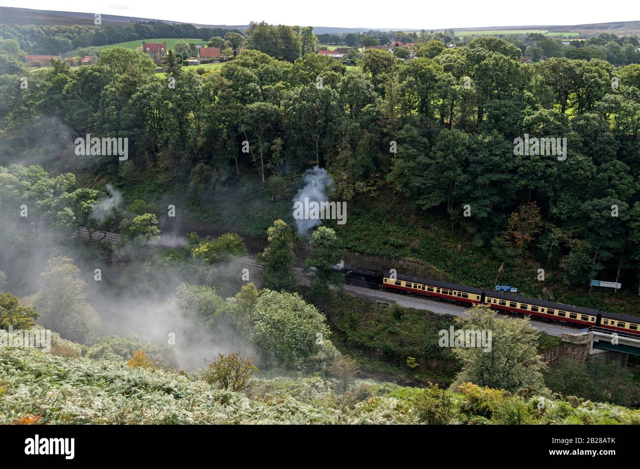 A steam train of the North Yorkshire Moors Railway on its way to ...