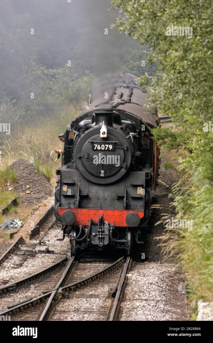 A passenger steam train of the North Yorkshire Moors railway heading ...