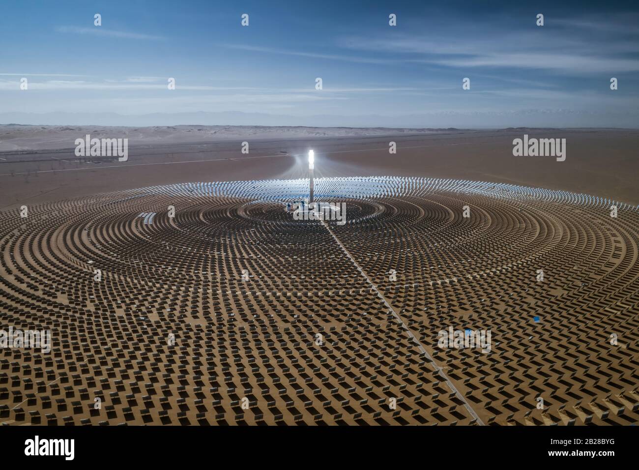 Aerial view of solar thermal plant uses mirrors that focus the sun's ...