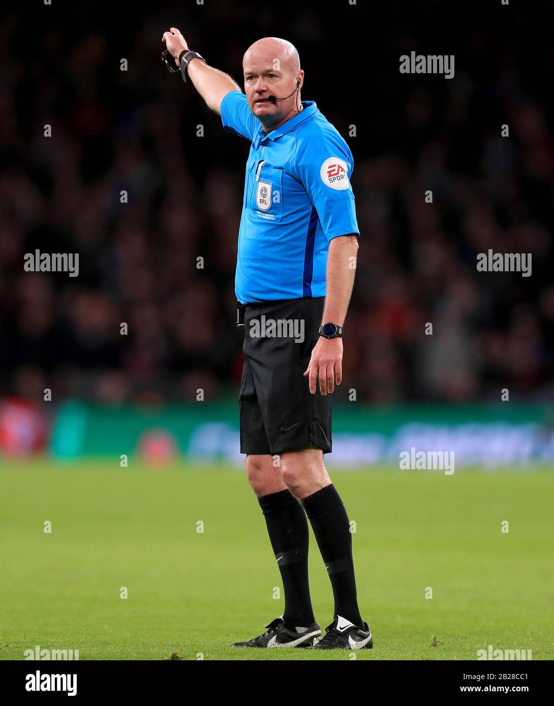 Referee Lee Mason gestures on the pitch during the Carabao Cup Final at ...