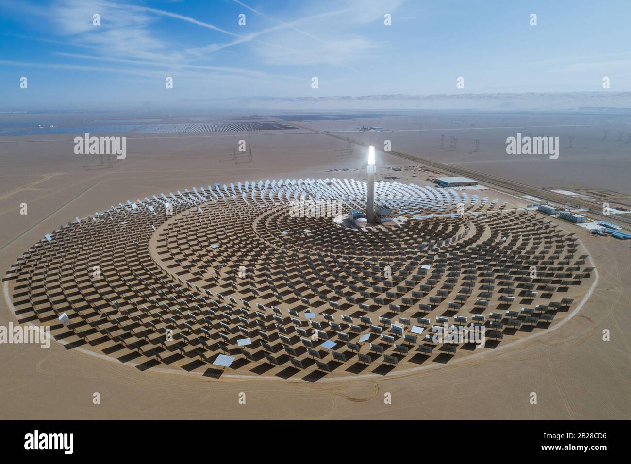 Aerial view of solar thermal plant uses mirrors that focus the sun's ...