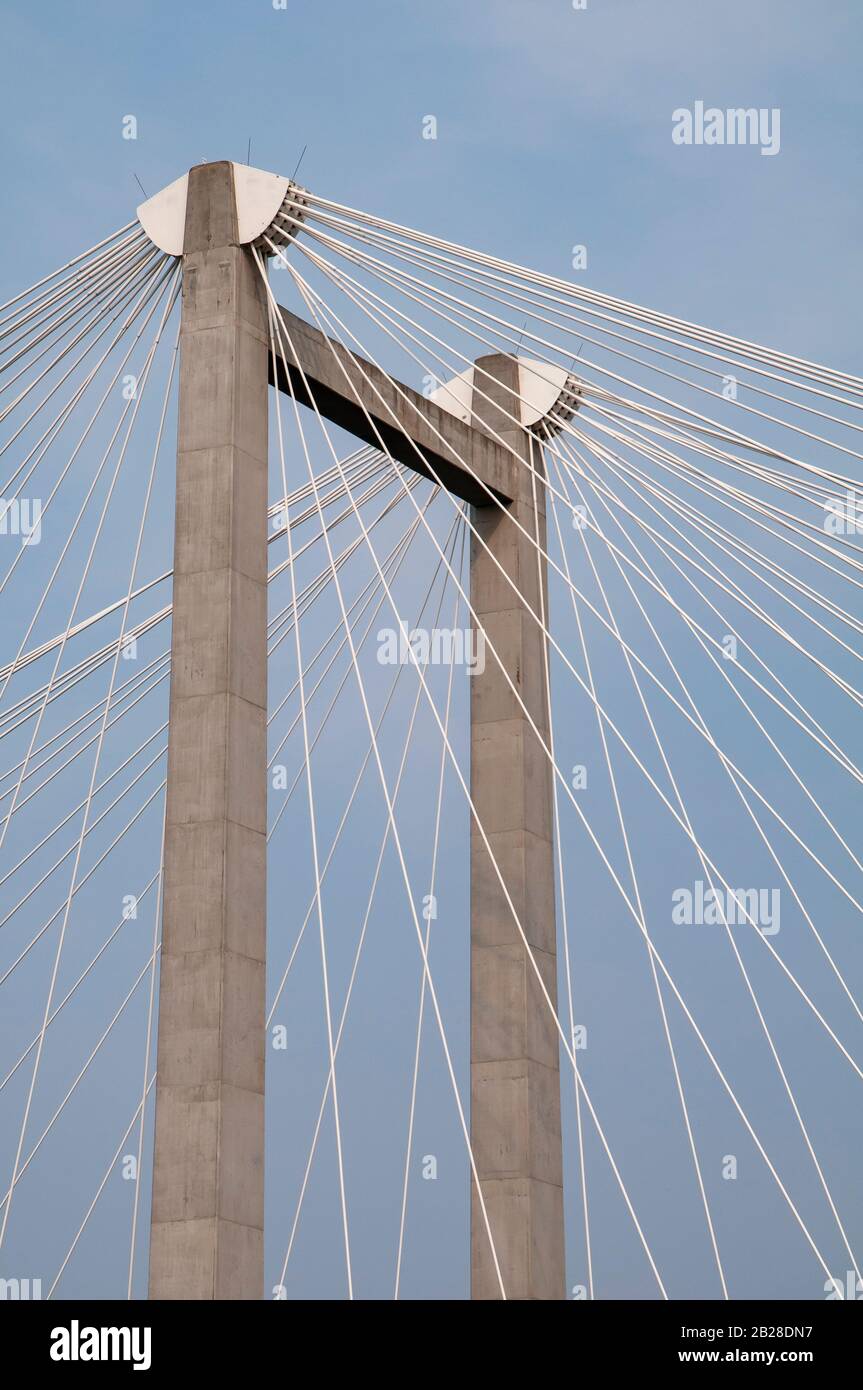 Long segmented metal suspension cables cropped to the top of the ...