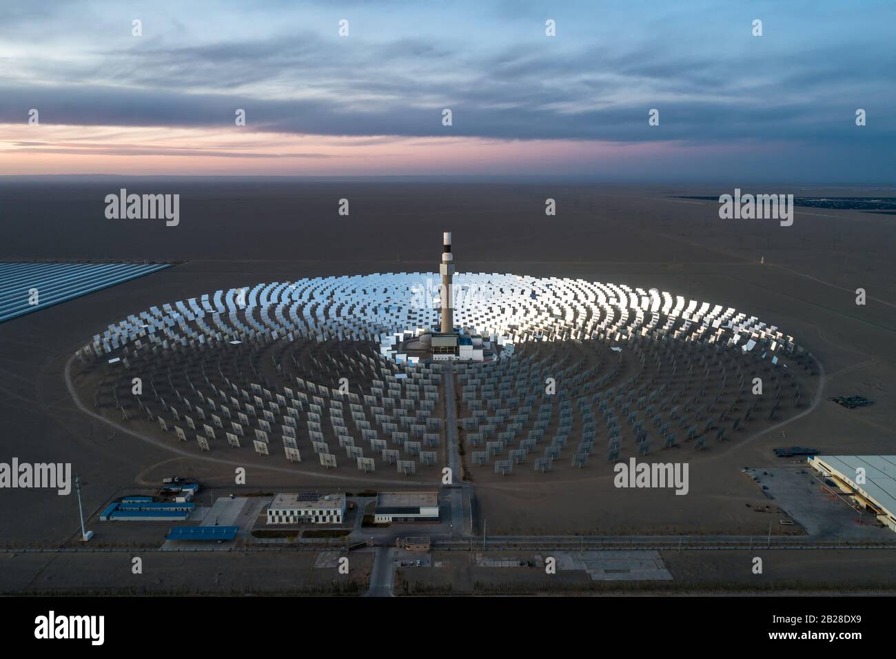 Aerial view of solar thermal plant uses mirrors that focus the sun's ...