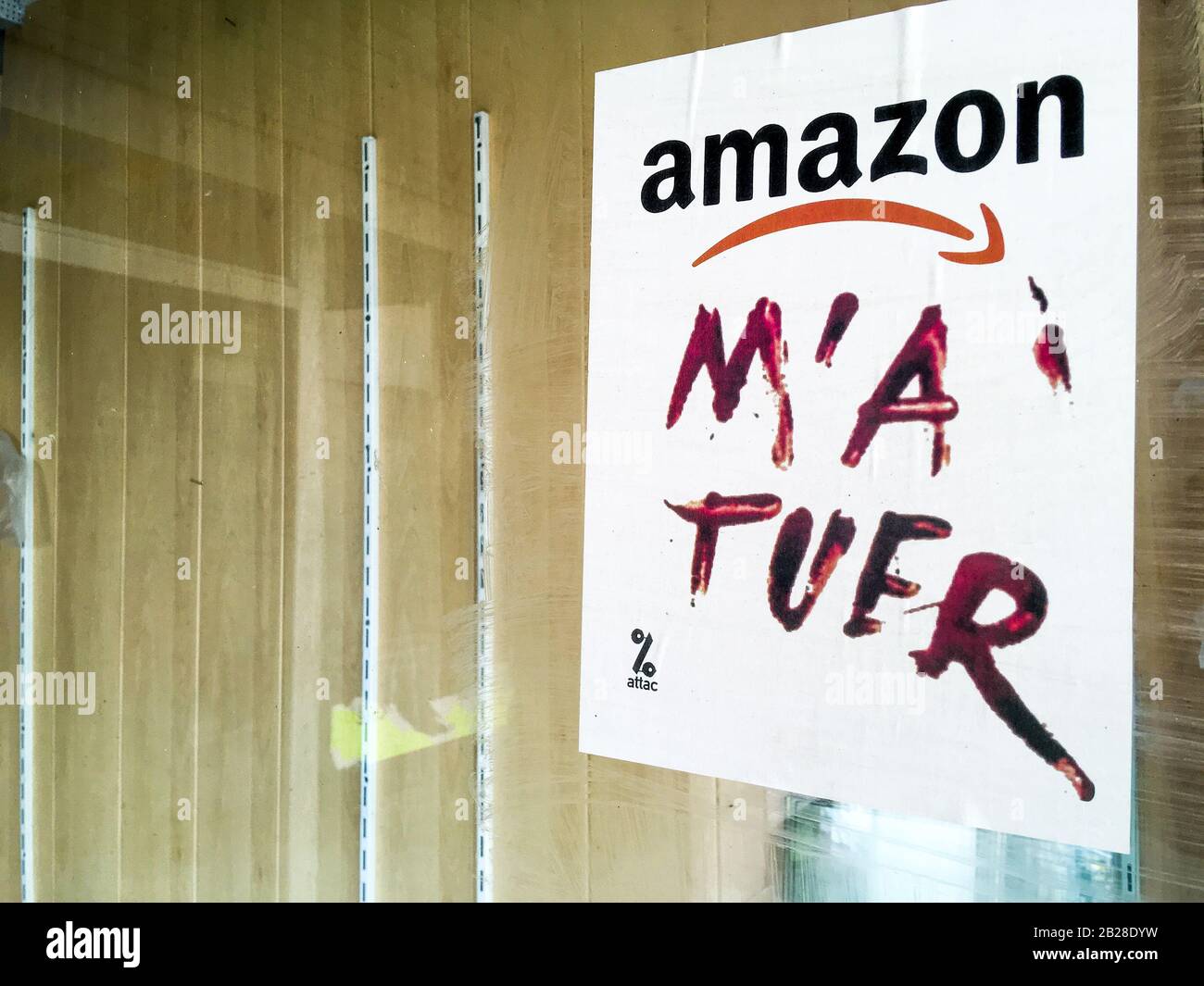 "Amazon Killed me", poster on the window of a closed shop, Mâcon ...