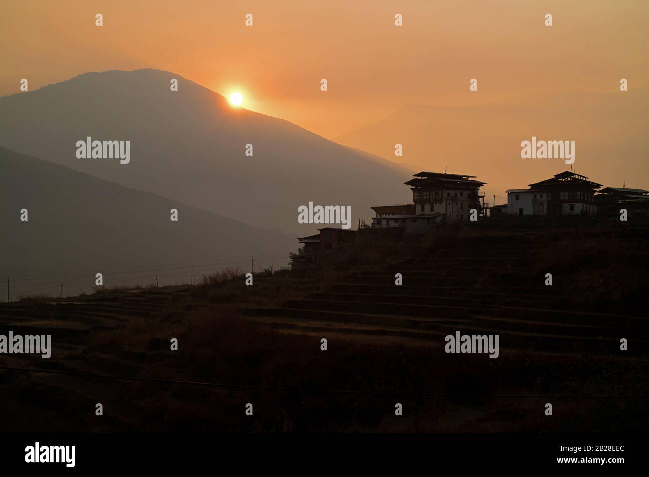 Traditional bhutanese farm house in the warm morning sun Stock Photo ...