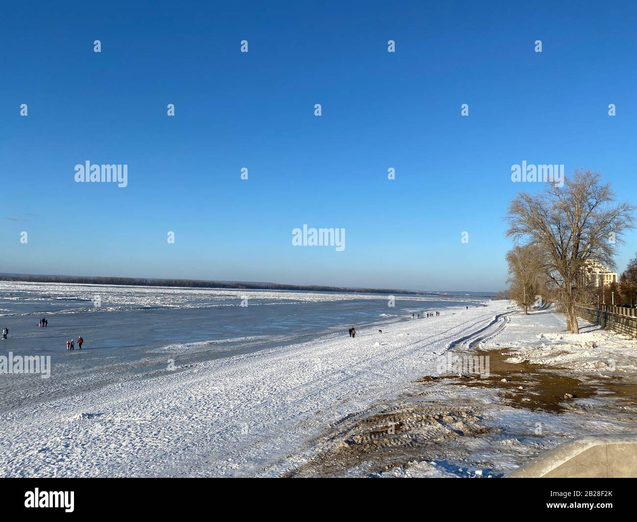 View from the embankment to the frozen Volga River in Samara, Russia ...