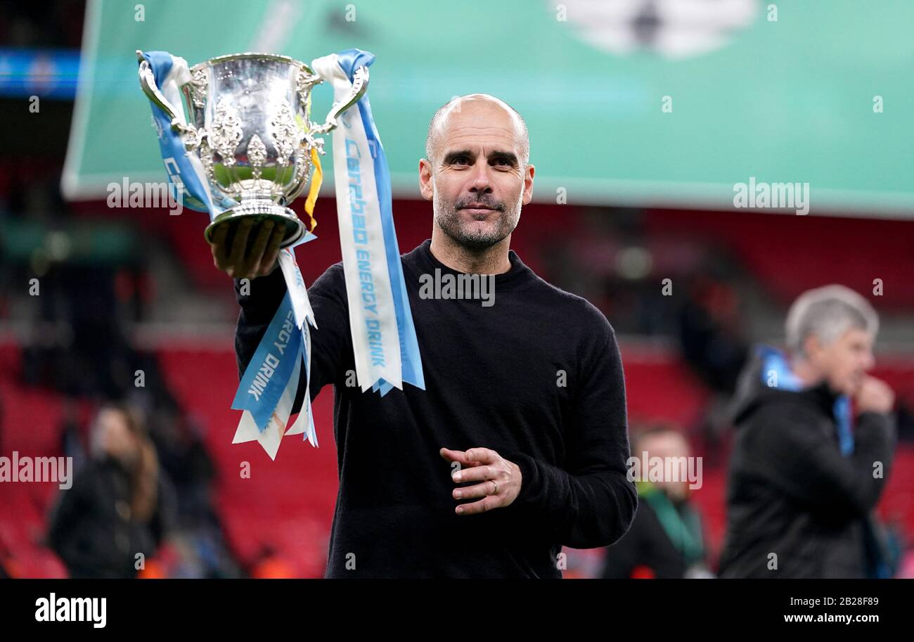 Manchester City manager Pep Guardiola the with trophy after the Carabao ...