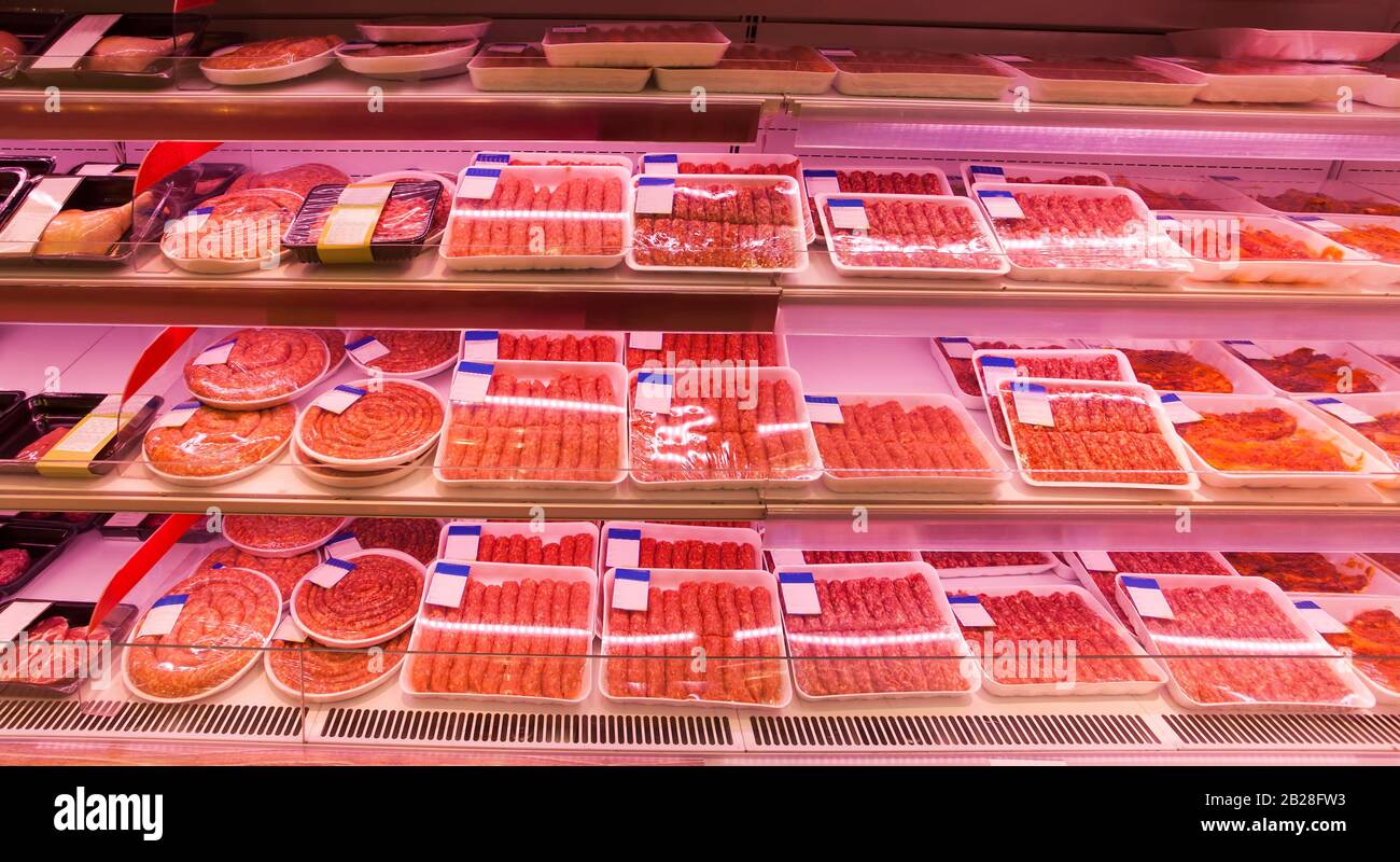 Woman at supermarket deli shelf hi-res stock photography and images - Alamy