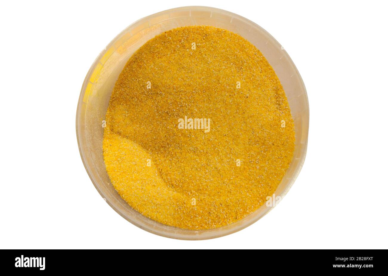 corn flour for polenta isolated on white Stock Photo - Alamy